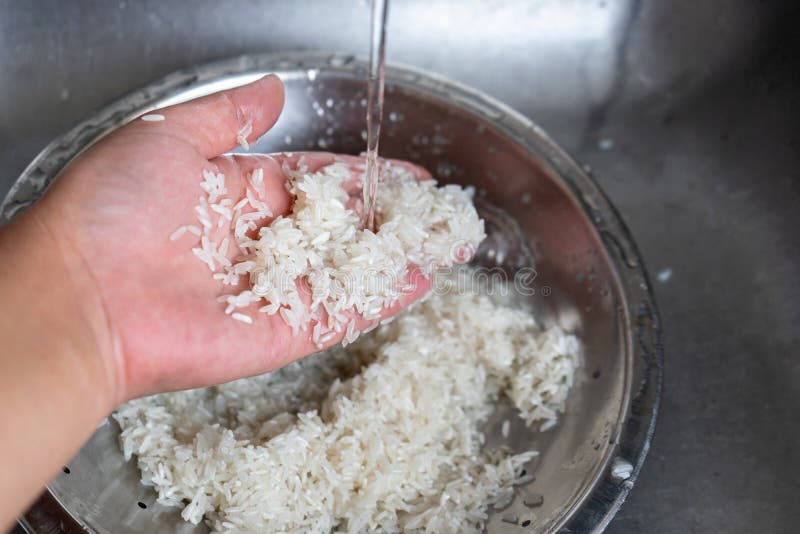 Washing white rice stock image. Image of kitchen, rinse - 174575079