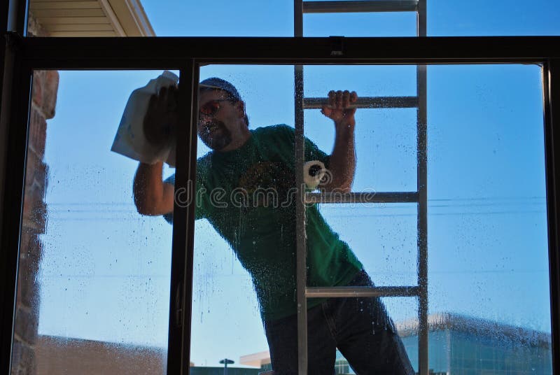 Washing windows stock image. Image of clean, reaching - 11783005