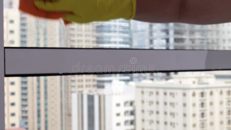 Washing Windows. Home Cleanliness Care. Soap Solution is Splashed on ...