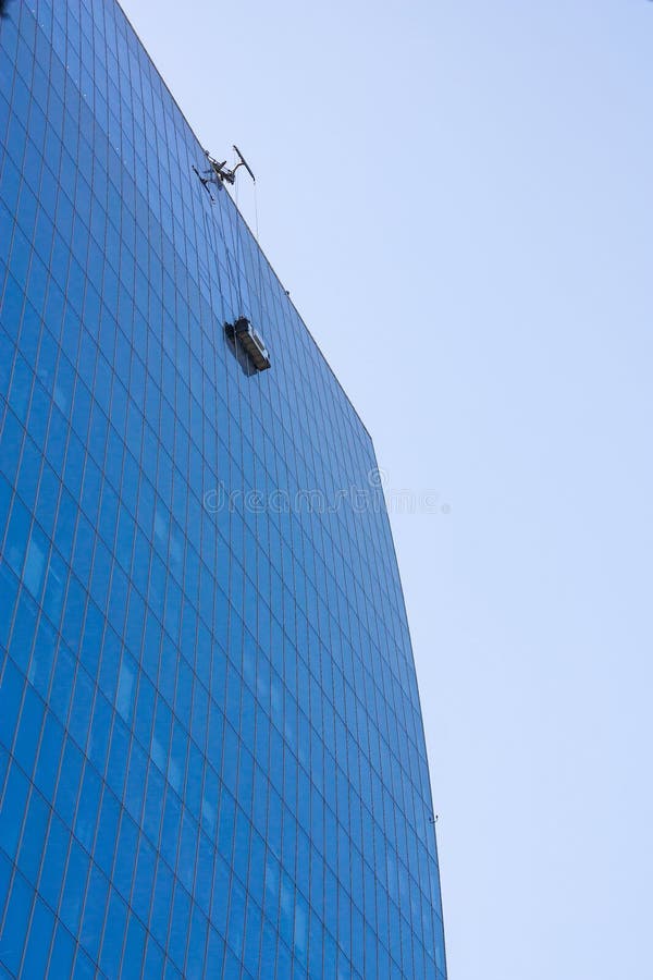 Washing Windows on the Outside, Industrially, in a High-rise Modern ...