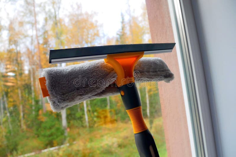 Washing Windows with a Window Brush. Window Cleaning Brush for Windows ...