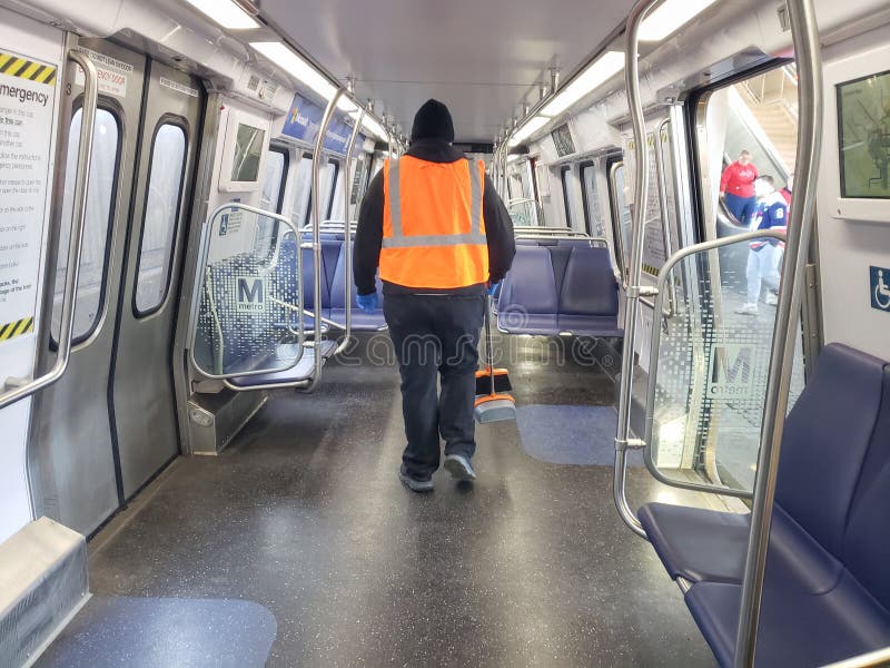Washington DC Metro Cleaner Checks the Cleanliness of the Inside of a ...