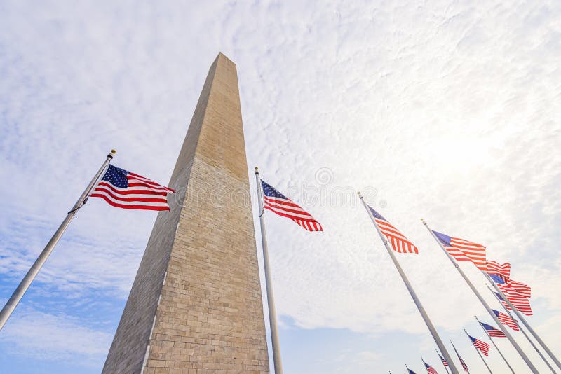 The Giant Washington Monument with Flags Stock Image - Image of ...