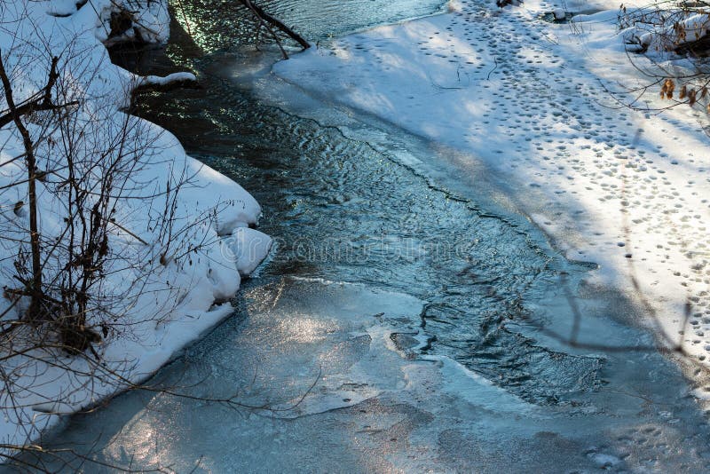 A Fast Mountain River, Broke through Ice, Snow and Formed a Washout ...