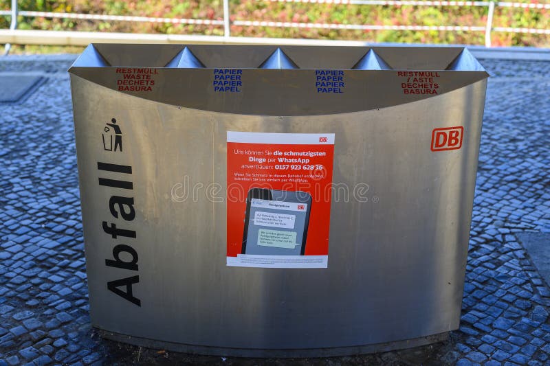 Waste Bin with Waste Separation on a Railway Platform with a Notice ...