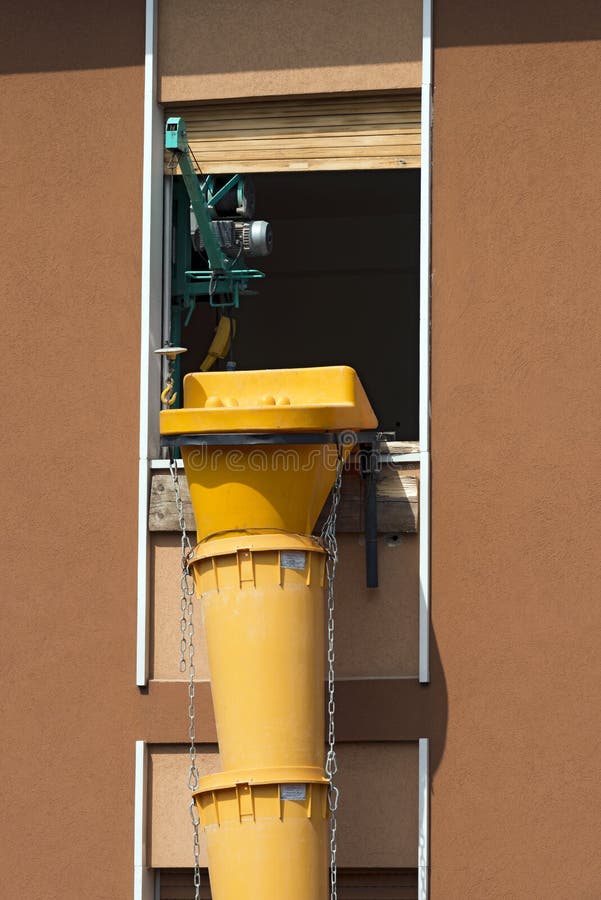 Waste Debris Chute - Construction Site Stock Photo - Image of exterior ...