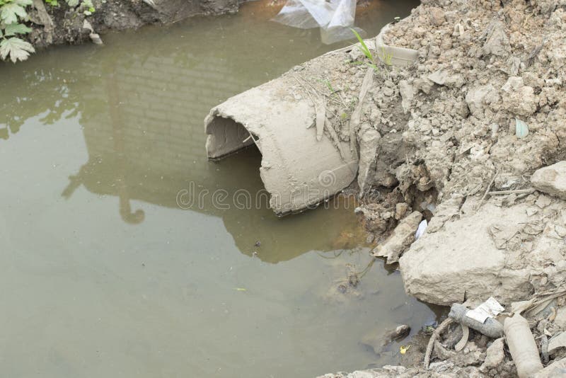 Waste Draining. Pipe in Ground. Old Sewerage. Pipe Goes into Pond Stock ...