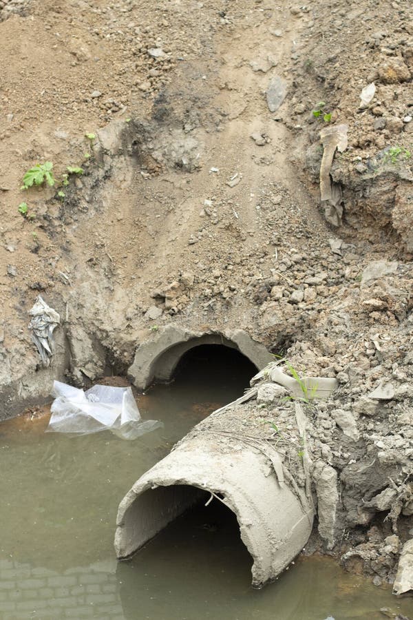 Waste Draining. Pipe in Ground. Old Sewerage. Pipe Goes into Pond Stock ...