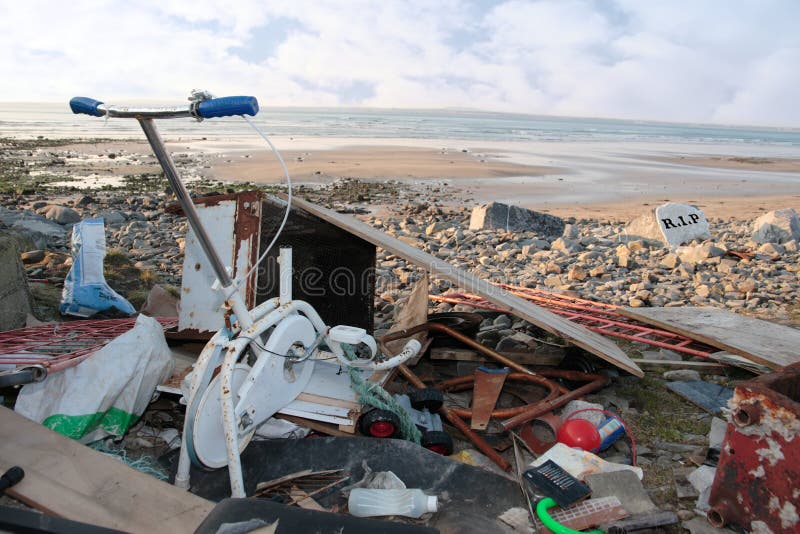 Waste dumped on a beach stock image. Image of disaster - 16707299