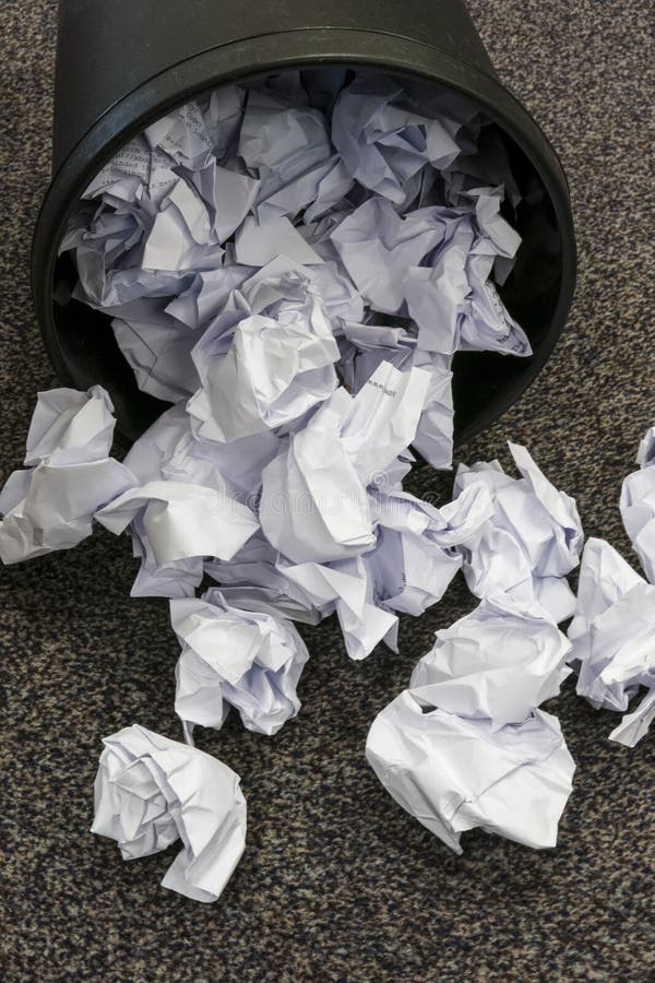 Waste Paper Bin Tipped Over and Paper Spilled Out Stock Photo - Image ...