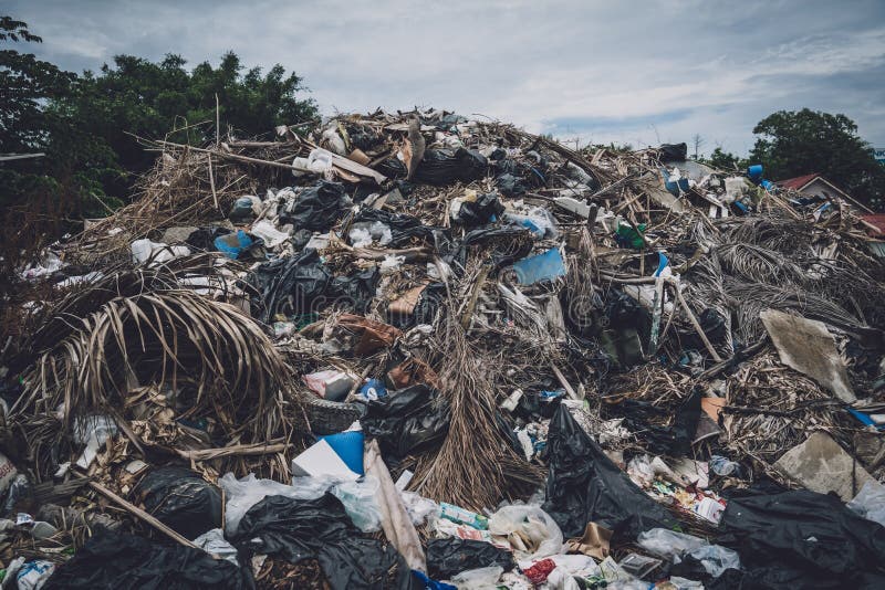 Waste Plastic Bottles and Other Types of Waste at the Ground Stock ...