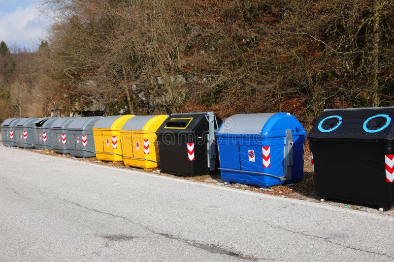 Waste and Recyclable Material Bins on the Roadside in a City Stock ...
