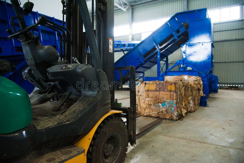 Waste recycling factory stock image. Image of manufacturing - 169700575