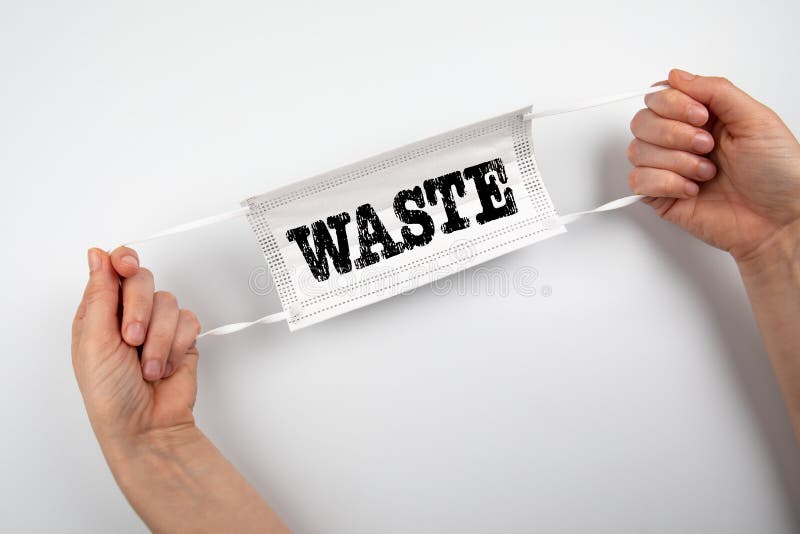 Waste Recycling and Sorting Concept. Medical Face Mask on a White ...