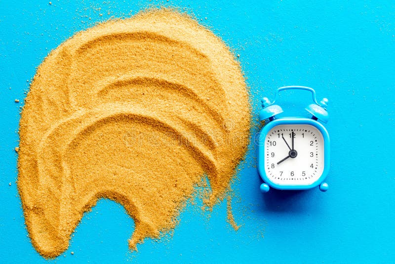 Waste of Time Concept. Clock Near Sand on Blue Background Top-down Copy ...