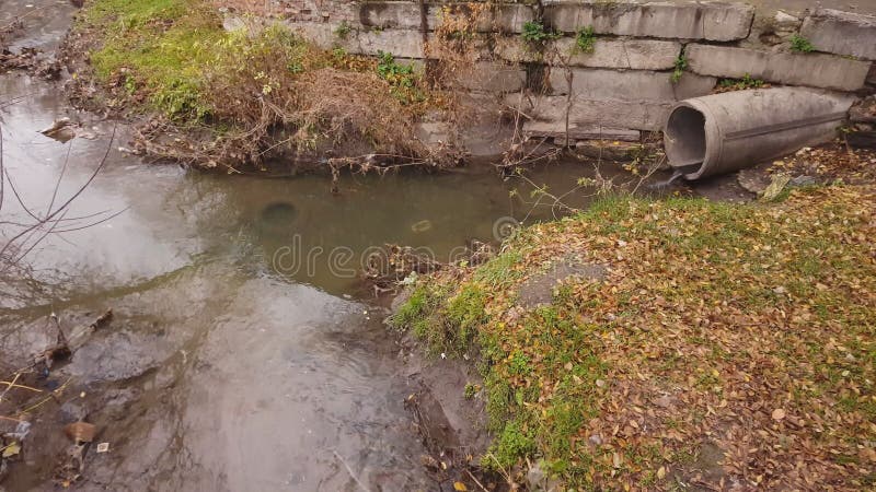 Waste Water, Pollution and Garbage in Urban Canal. Stock Footage ...