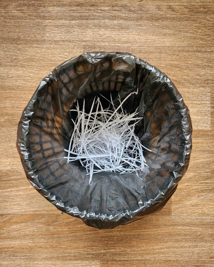 A Wastebasket Filled with Shredded Paper from a Shredder Stock Photo ...