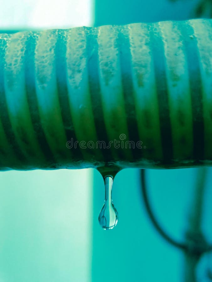 Wasting Water Drops in the Pipe Stock Photo - Image of purple, glass ...