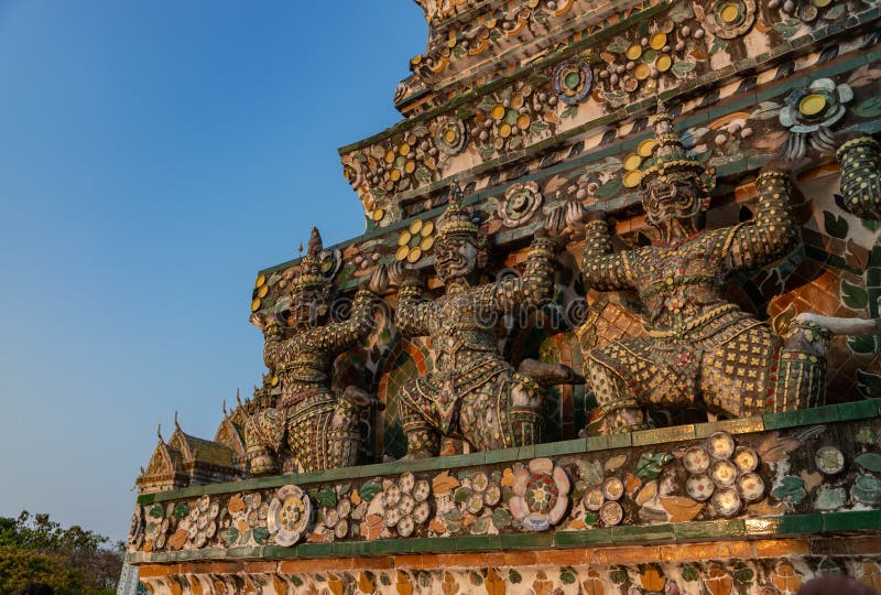 Wat Arun Temple Statues stock photo. Image of tourism - 320546058