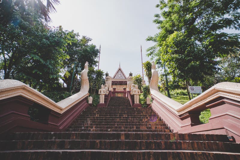 Wat Phnom Temple in Phnom Penh Stock Photo - Image of city, tourists ...