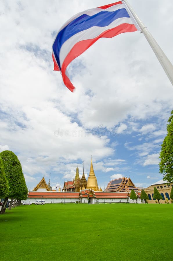 Wat Phra Kaew and the flag stock photo. Image of history - 25781242