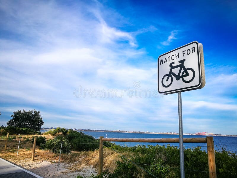 Watch for Bicycle Sign with Blue Sky in the Background. Stock Image ...