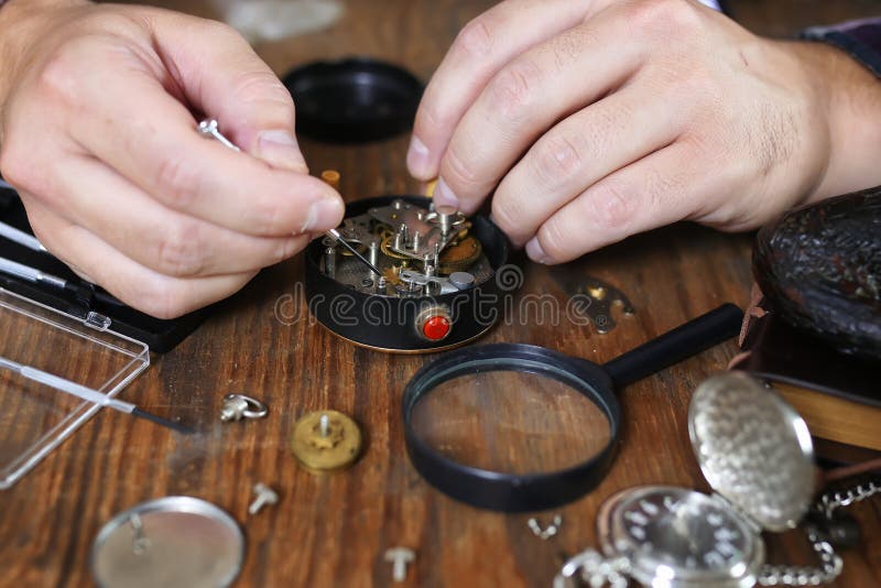 Watch clock repair stock image. Image of pipe, human - 78802959