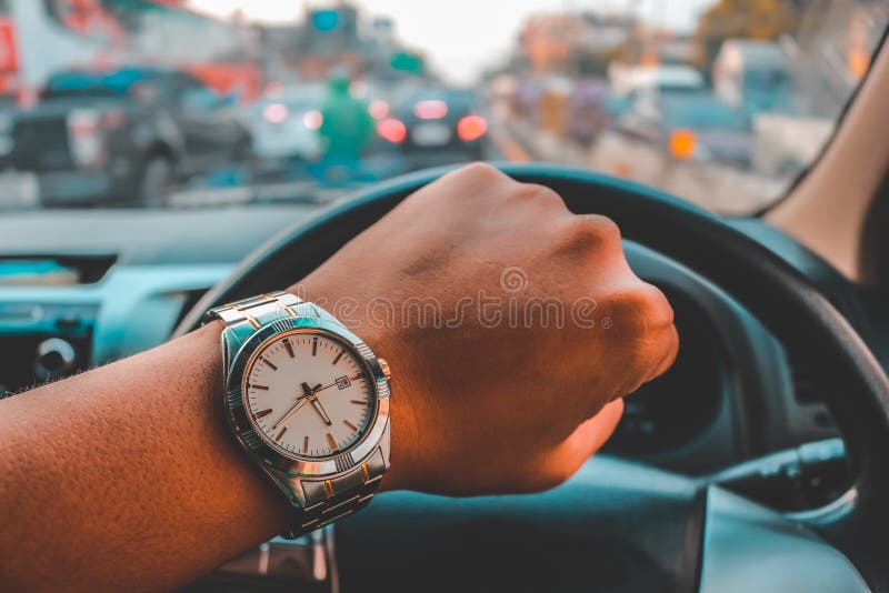 Watch the Clock after Work. Stock Image - Image of driving, hand: 112788701