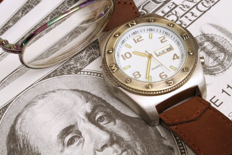 Watch glasses & money stock image. Image of finance - 1752295