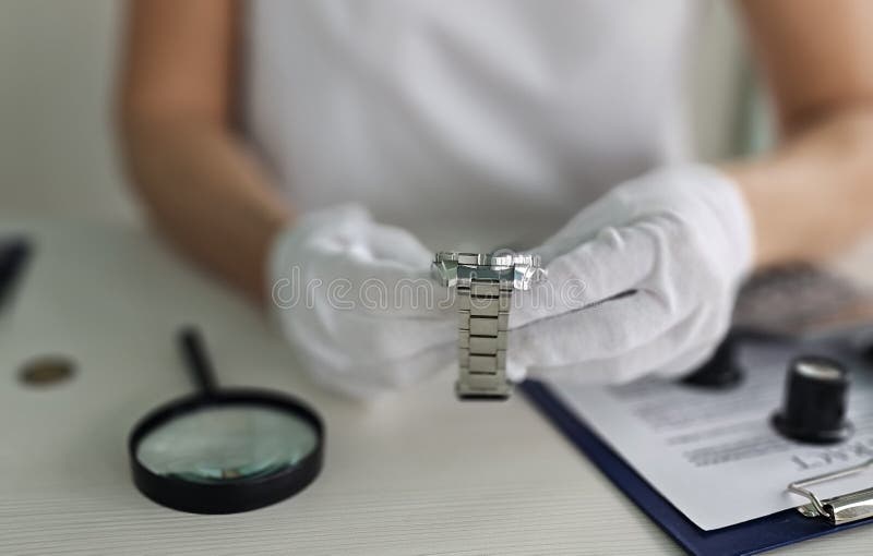 Watch Inspection Process at an Appraisal Location with Magnifying Glass ...
