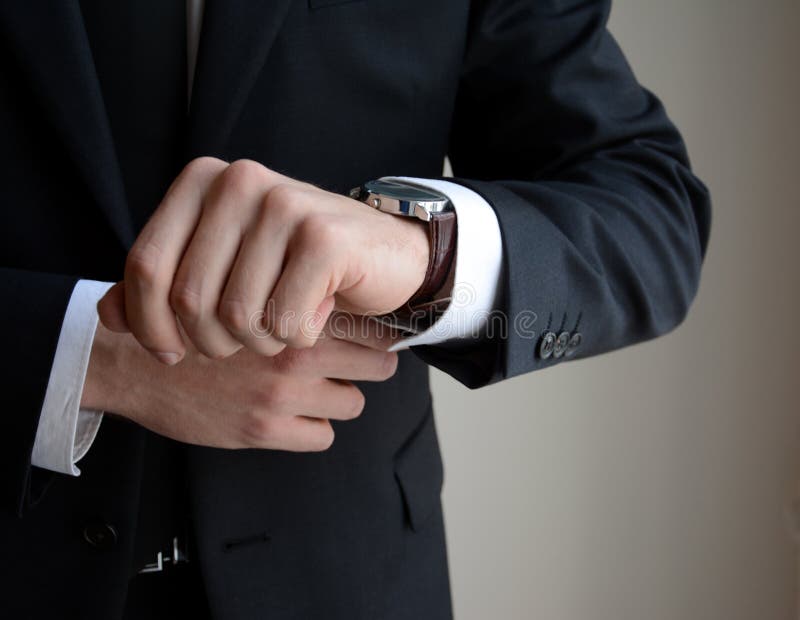 Watch on the male hand stock image. Image of isolated - 101241973