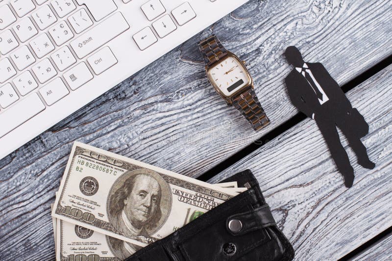 Watch, money in wallet. stock photo. Image of paper - 160931308