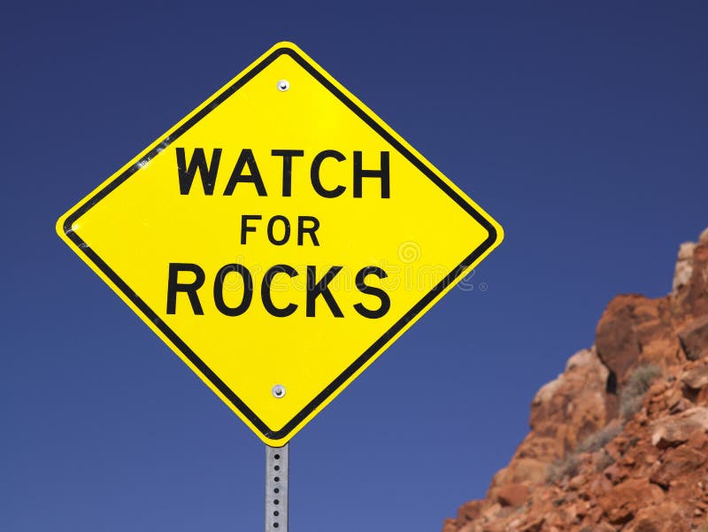 Watch for Rocks Sign Next To Highway Stock Image - Image of sunny ...