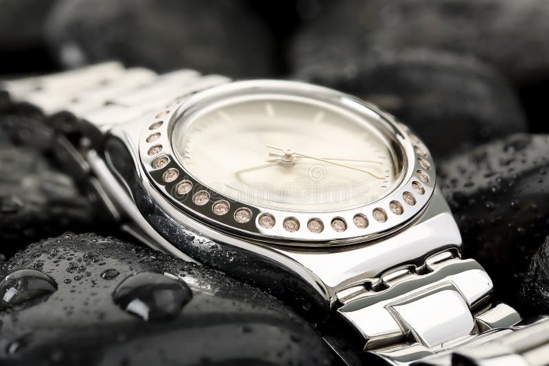 Watch on stones stock image. Image of chronograph, glossy - 62835449