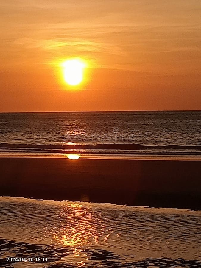 Watch sunset in Borneo stock photo. Image of sunset - 371150820