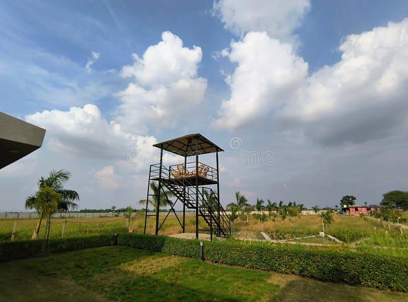 Watch Tower in a Farm Blue Sky and White Cotton Clouds Stock Image ...