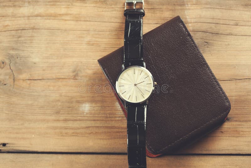 Watch on wallet stock image. Image of leather, watch - 144438437