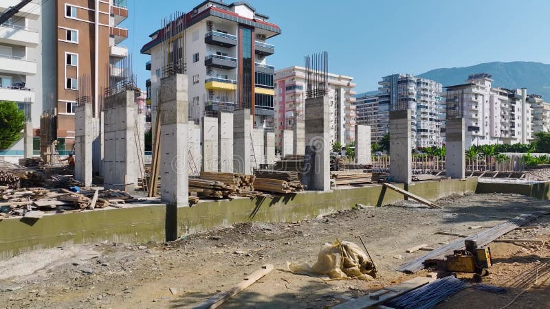 Aerial View 4K: Workers Pouring Concrete at a Busy Construction Site ...