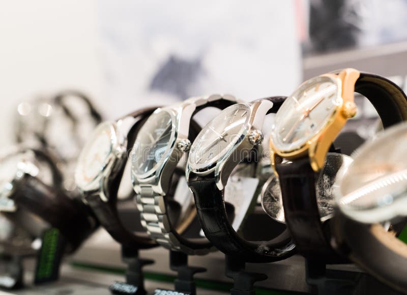Watches in a luxury store stock image. Image of famous - 133993521