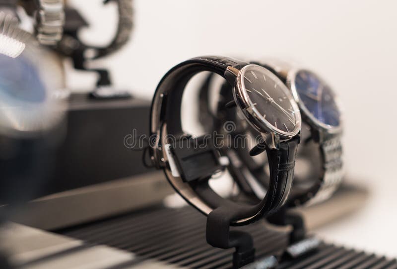 Watches in a luxury store stock photo. Image of stylish - 133993704