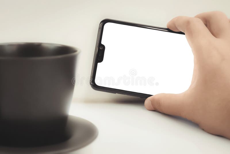 Watching Mobile Phone during a Coffee Break Stock Photo - Image of ...