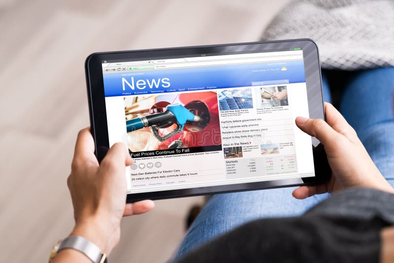 The Guy Is Watching The News On His Smartphone. Quarantine Home ...