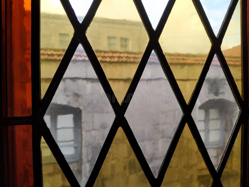 Watching Out a Stained Glass Window. Looking at the View of an Old ...