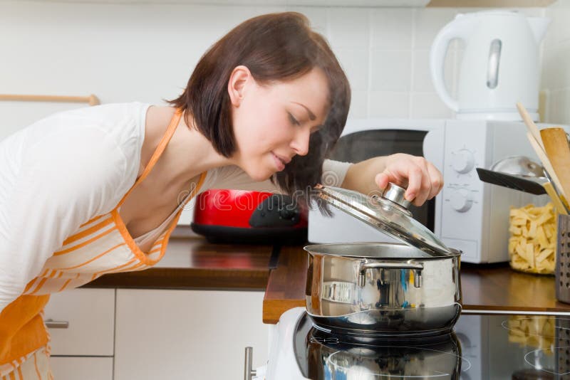Female Cook Watching Pot Boil Stock Photos - Free & Royalty-Free Stock ...