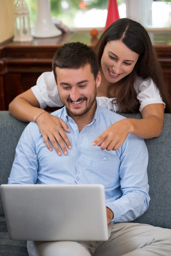 Watching Something on Laptop Stock Photo - Image of caucasian, smiling ...