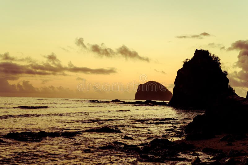 Watching Sunrise and Rock Formation at the Shore Stock Image - Image of ...