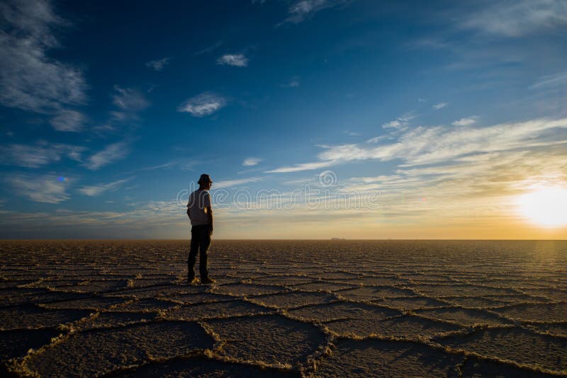 Watching the Sunset in the Desert Stock Image - Image of clouds, salt ...