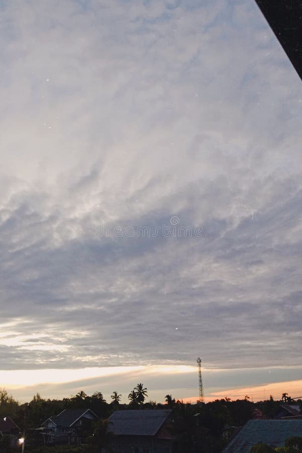 Watching the Sunset on a Sunny Afternoon on the Roof of the House Stock ...