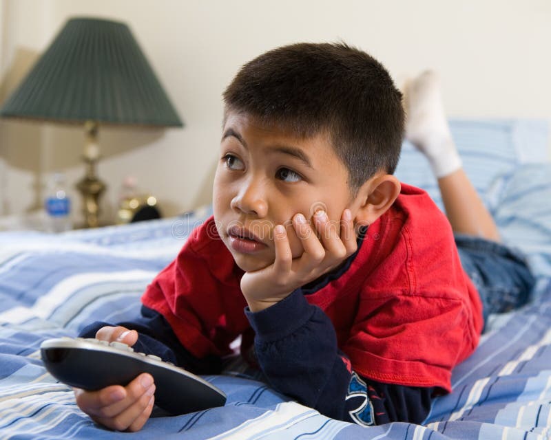 Young Boy Watching Television at Home Stock Photo - Image of camera ...