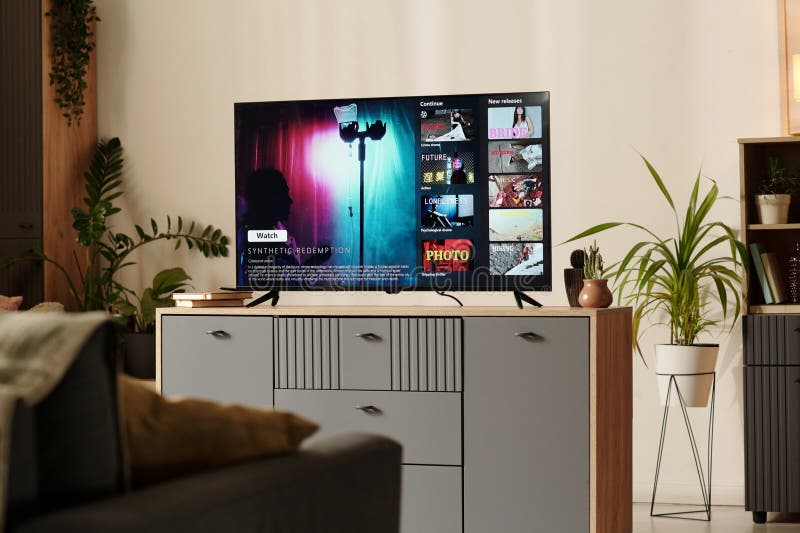 Watching Television Inside Modern Living Room Stock Image - Image of ...